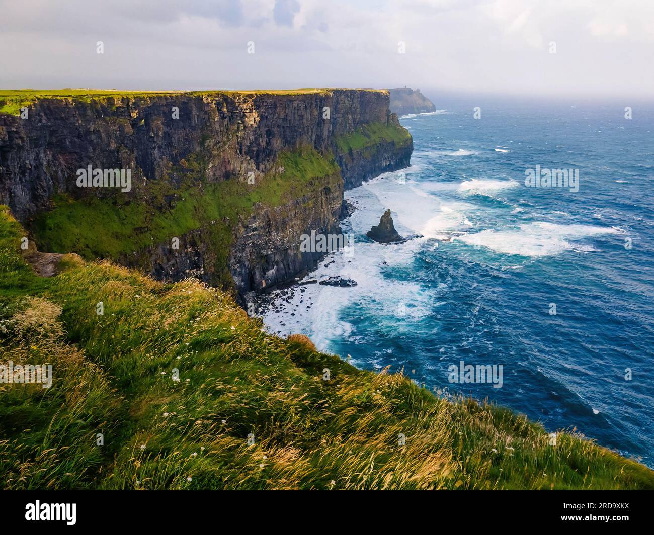 Scenic aerial panoramic view of Cliffs of Moher at sunrise in Ireland ...