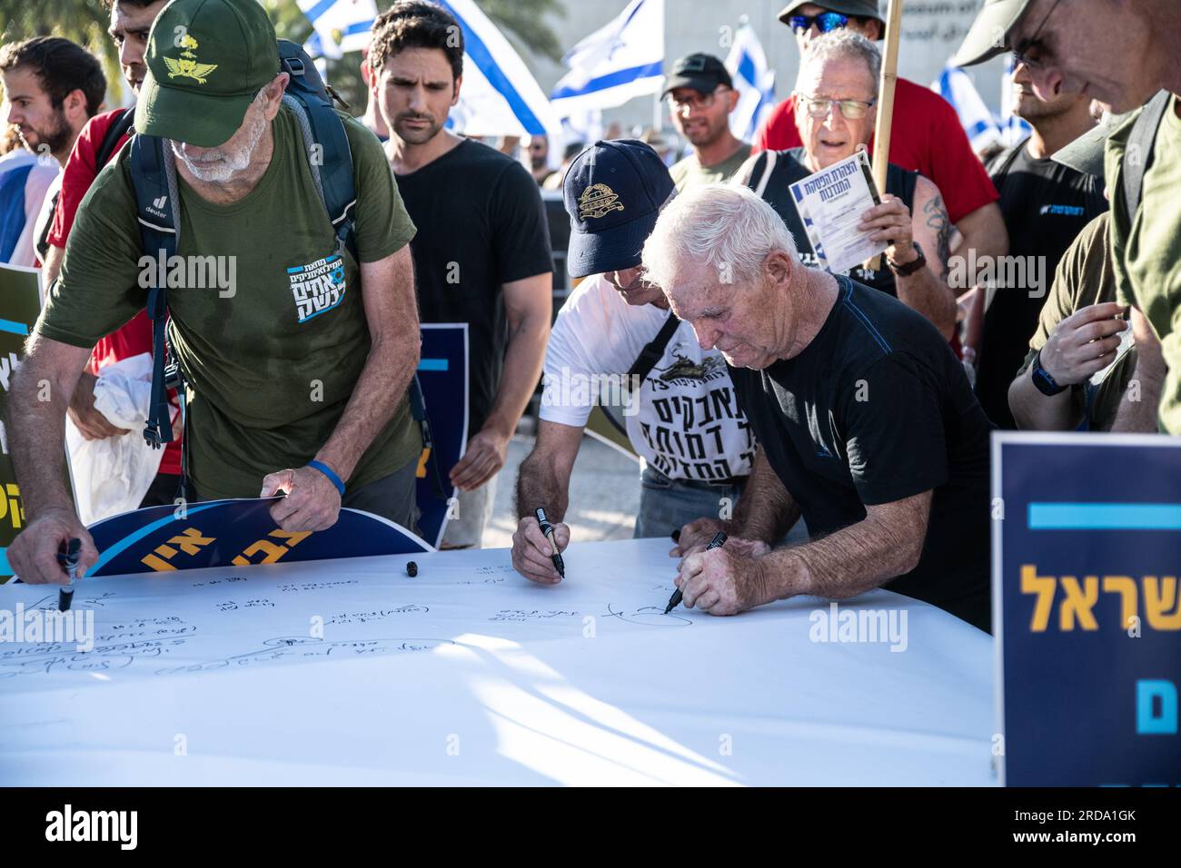 Israel. 19th July, 2023. Former Israeli General Amiram Levin signs a ...