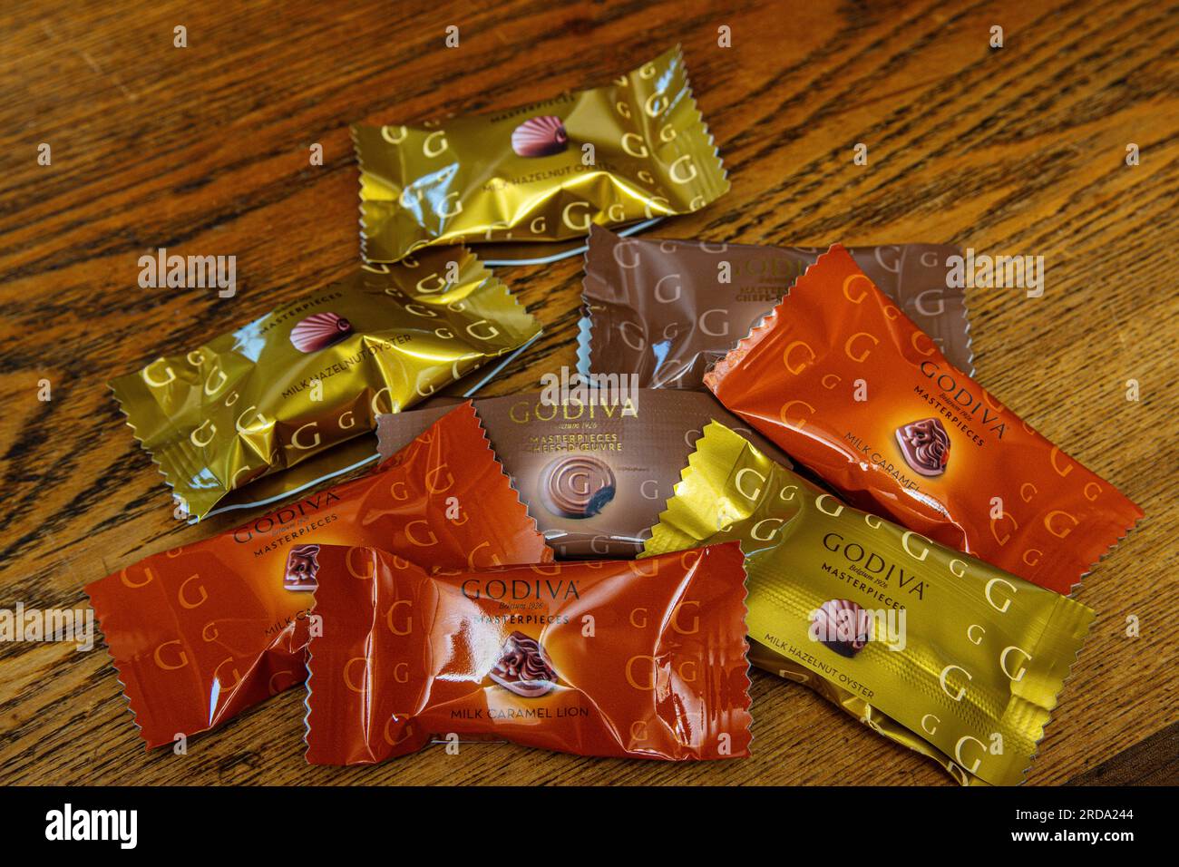 A variety of individually wrapped Godiva chocolates Stock Photo - Alamy