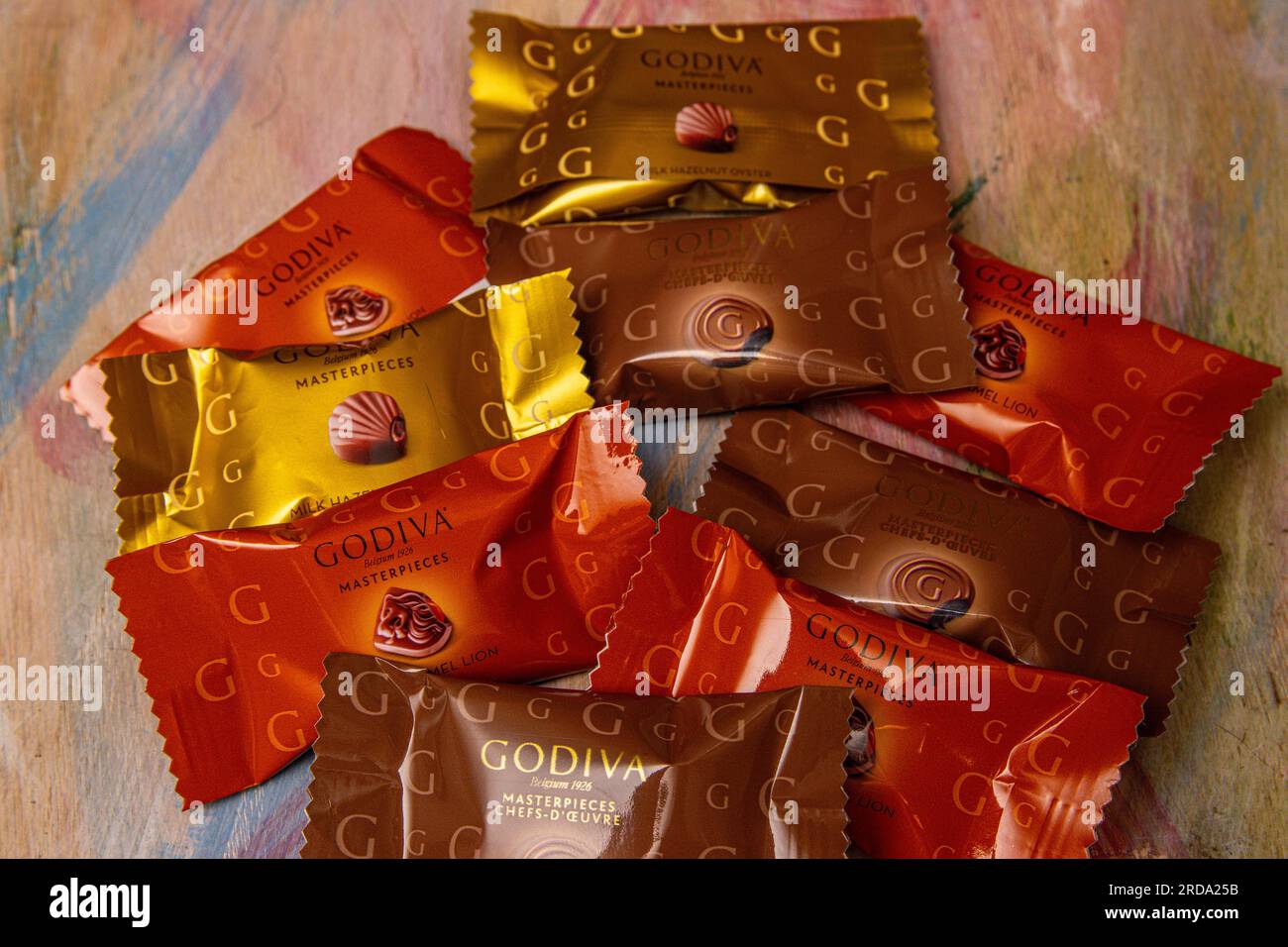 A variety of individually wrapped Godiva chocolates Stock Photo - Alamy