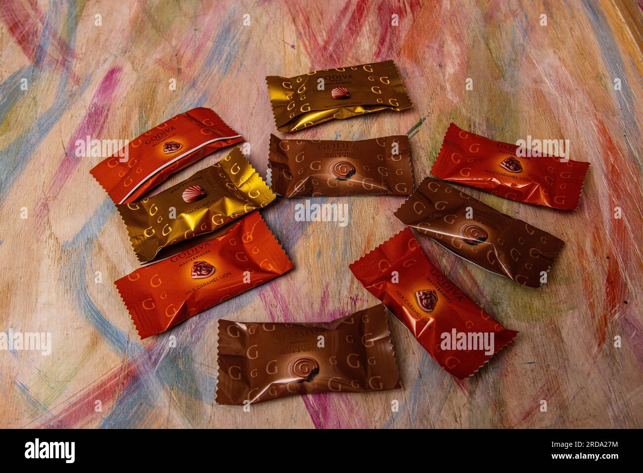 A variety of individually wrapped Godiva chocolates Stock Photo - Alamy