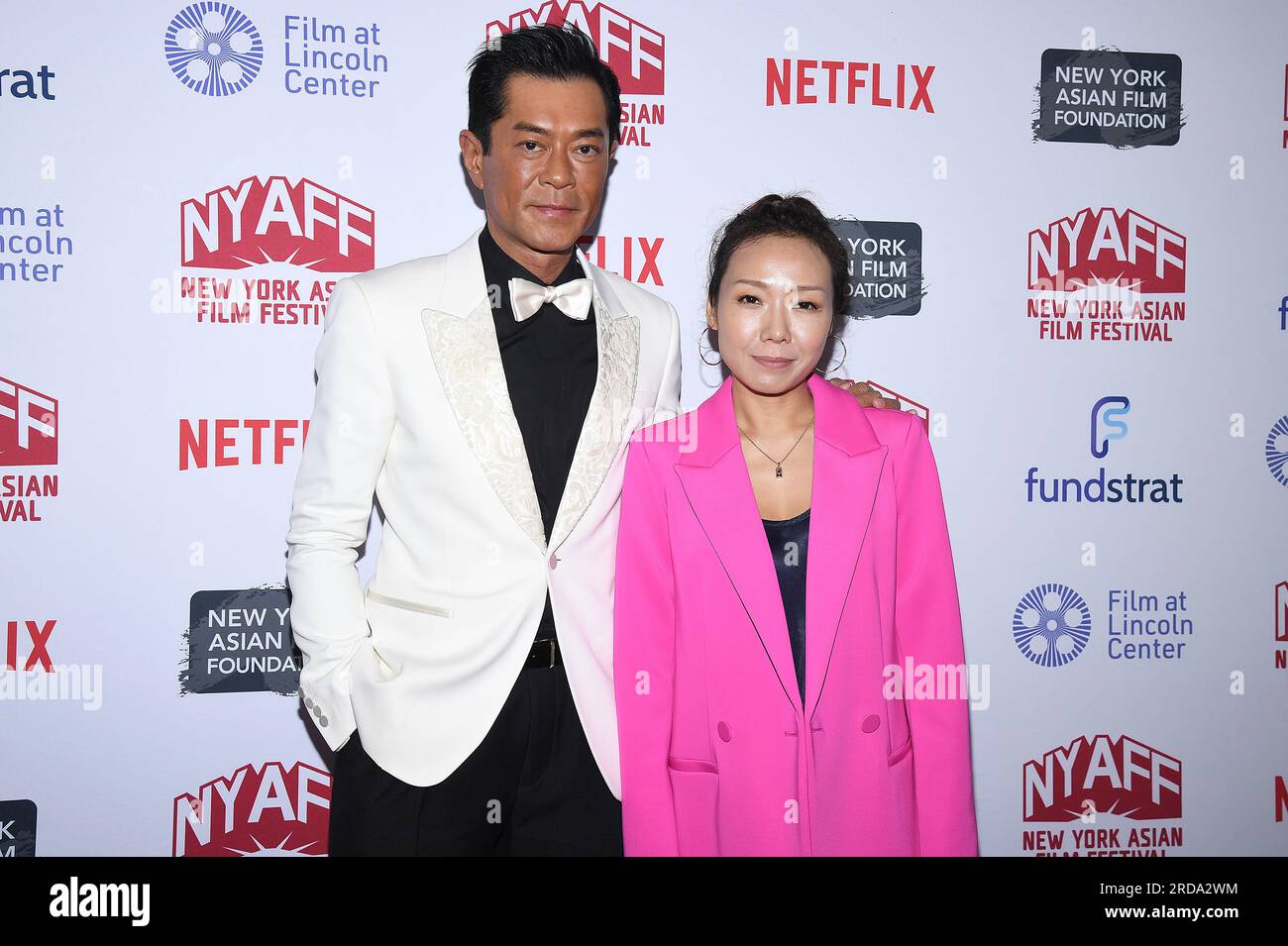 New York, USA. 19th July, 2023. (L-R) Actor Louis Koo and Director ...