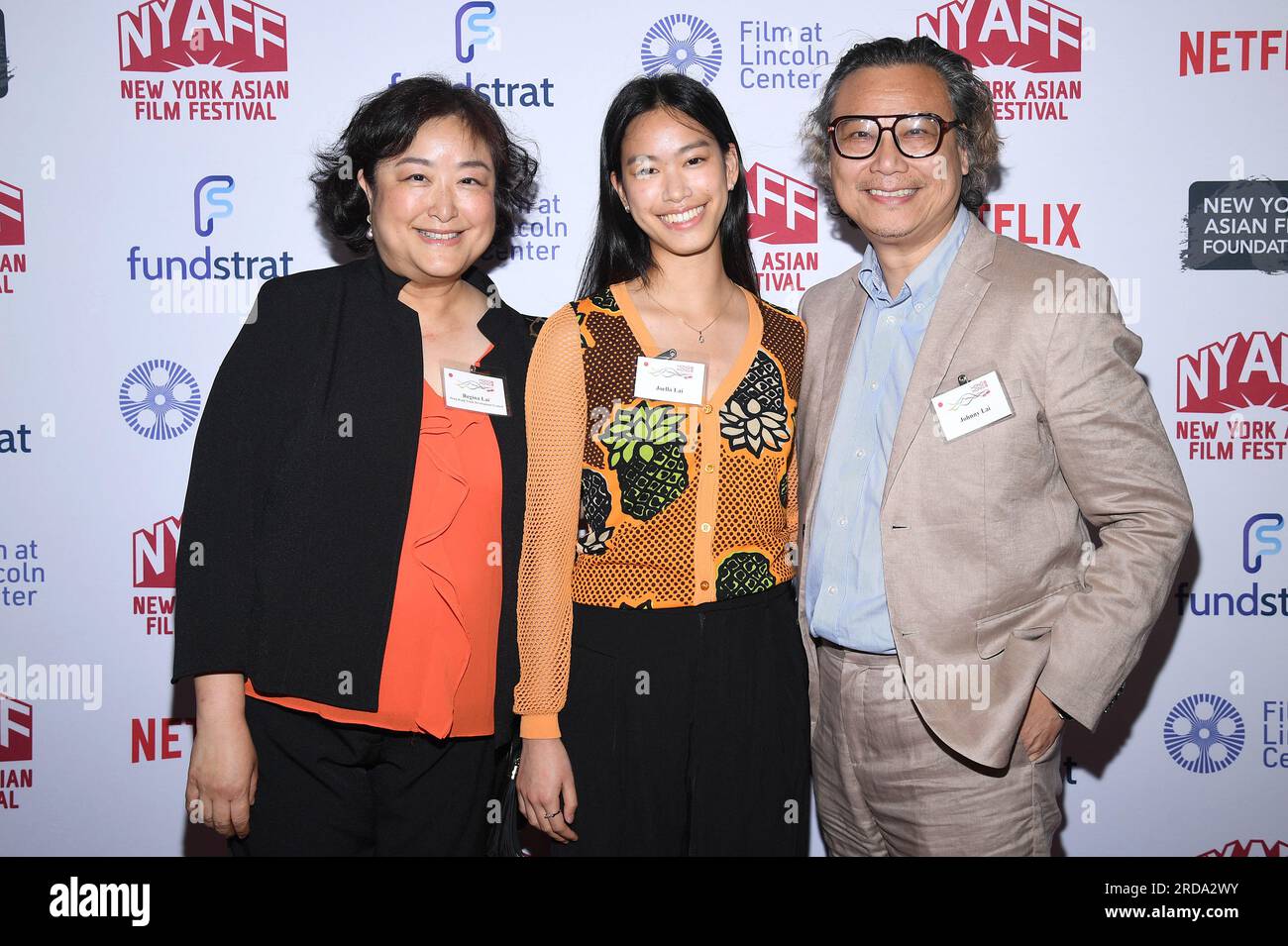 New York, USA. 19th July, 2023. (L-R) Regina Lai, Joella Lai and Johnny ...