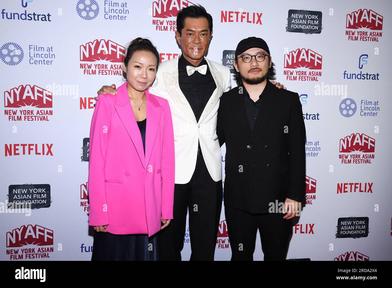 New York, USA. 19th July, 2023. (L-R) Director Cheuk Wan-chi, Actor ...