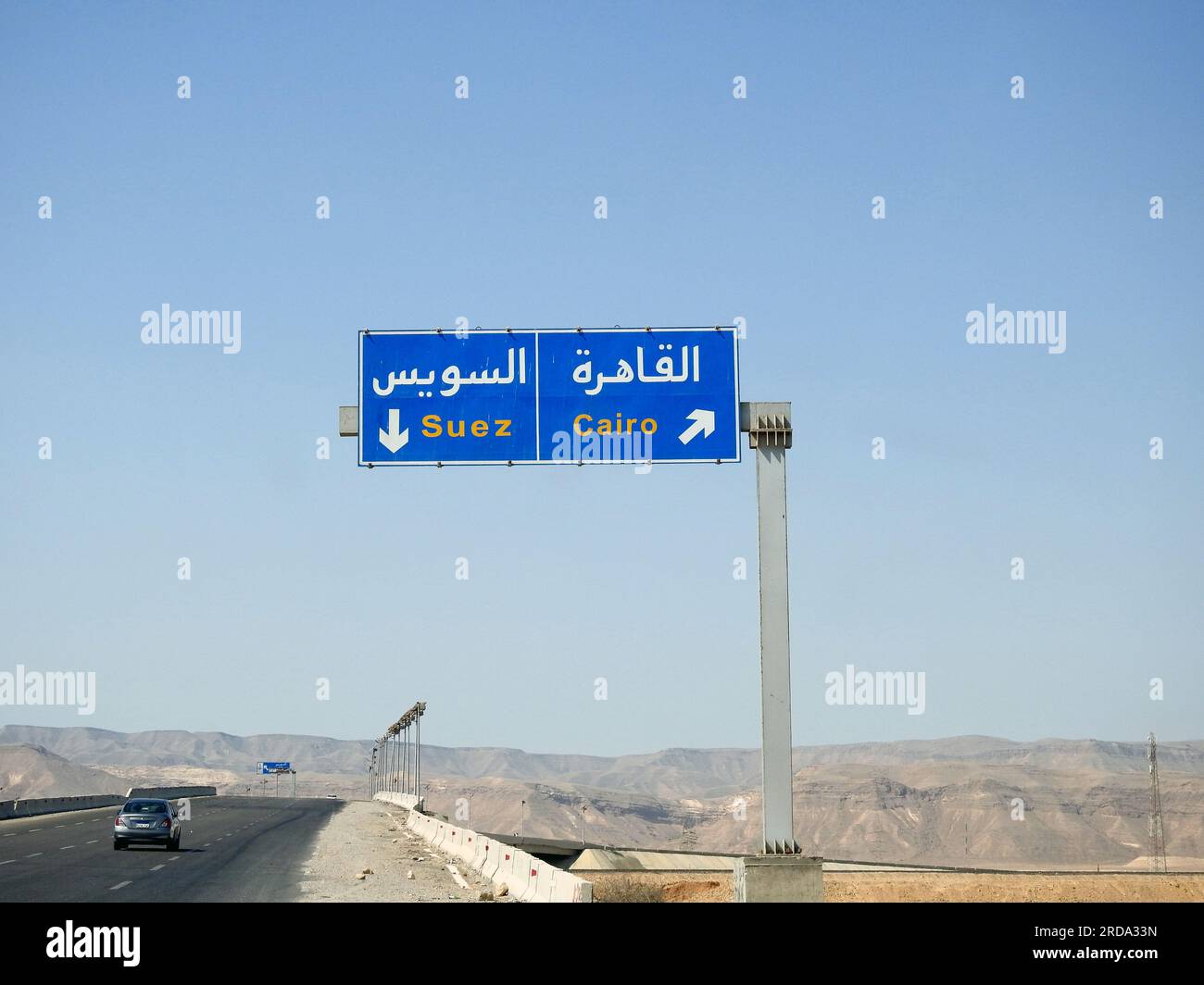 A road sign board before Suez Cairo highway gives the direction to the ...