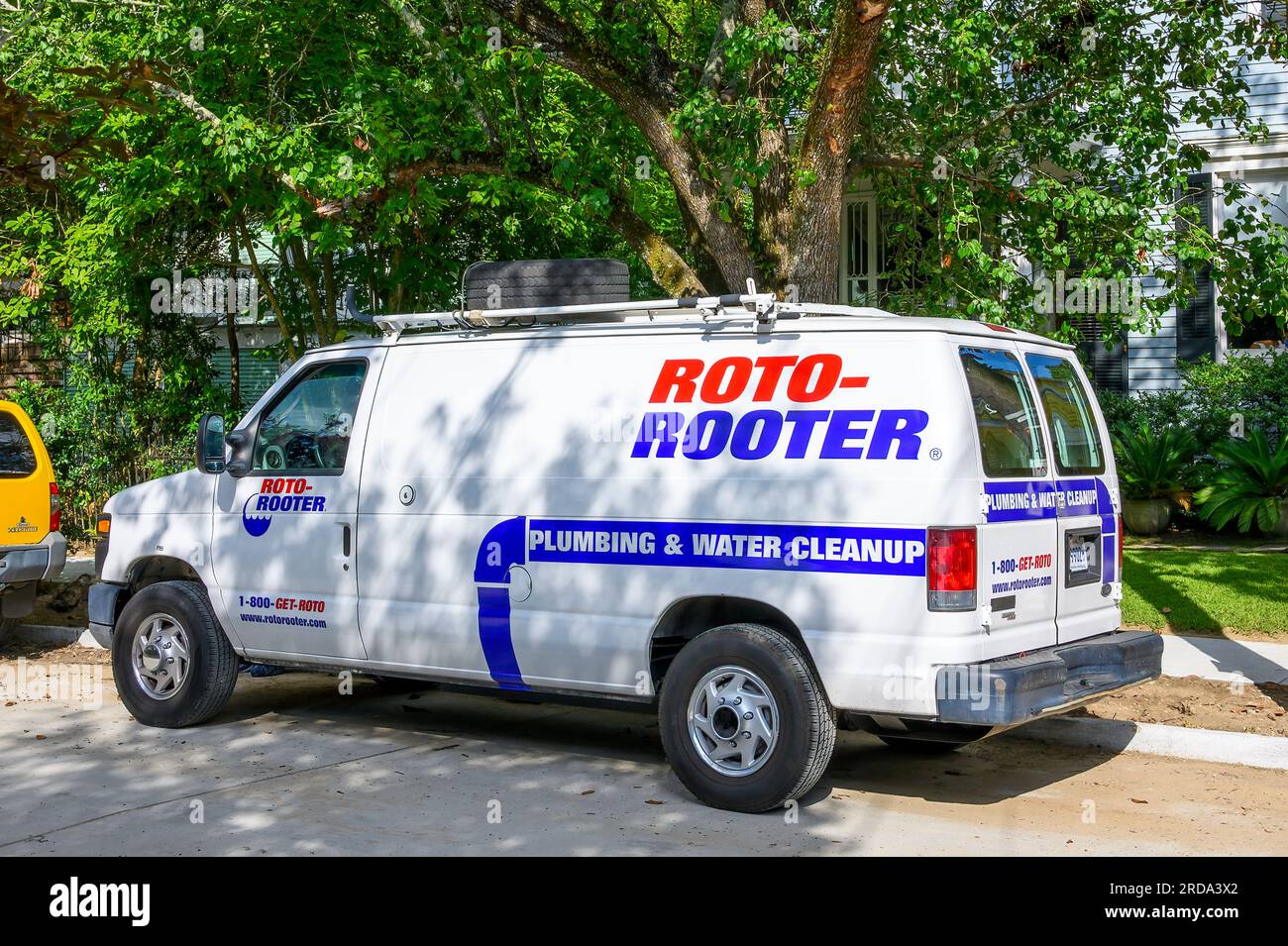 NEW ORLEANS, LA, USA - JULY 19, 2023: Roto-Rooter service van in an Uptown neighborhood Stock ...