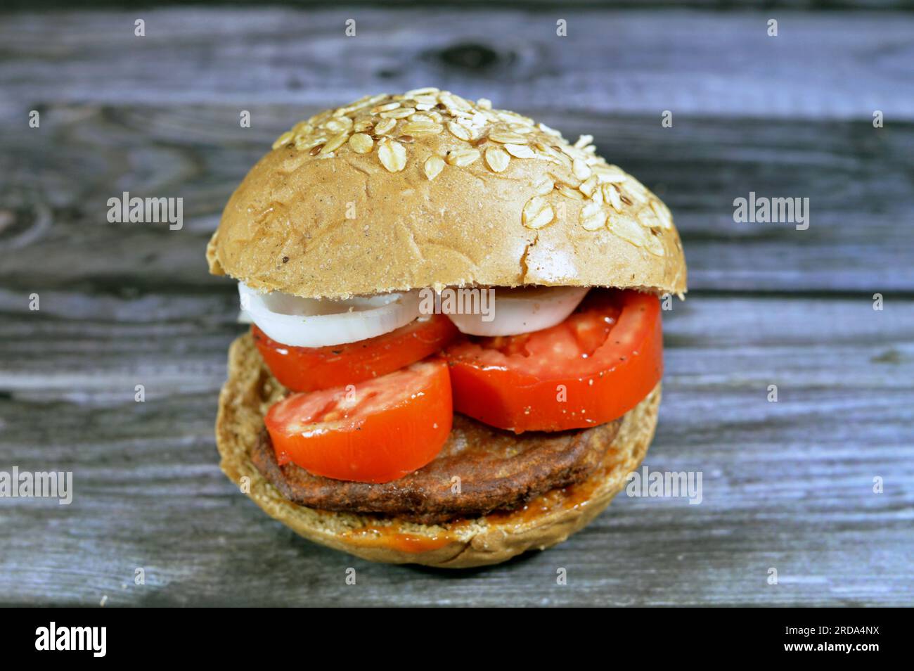 spicy fried beef burger cooked in a boiling shallow oil with slices of ...