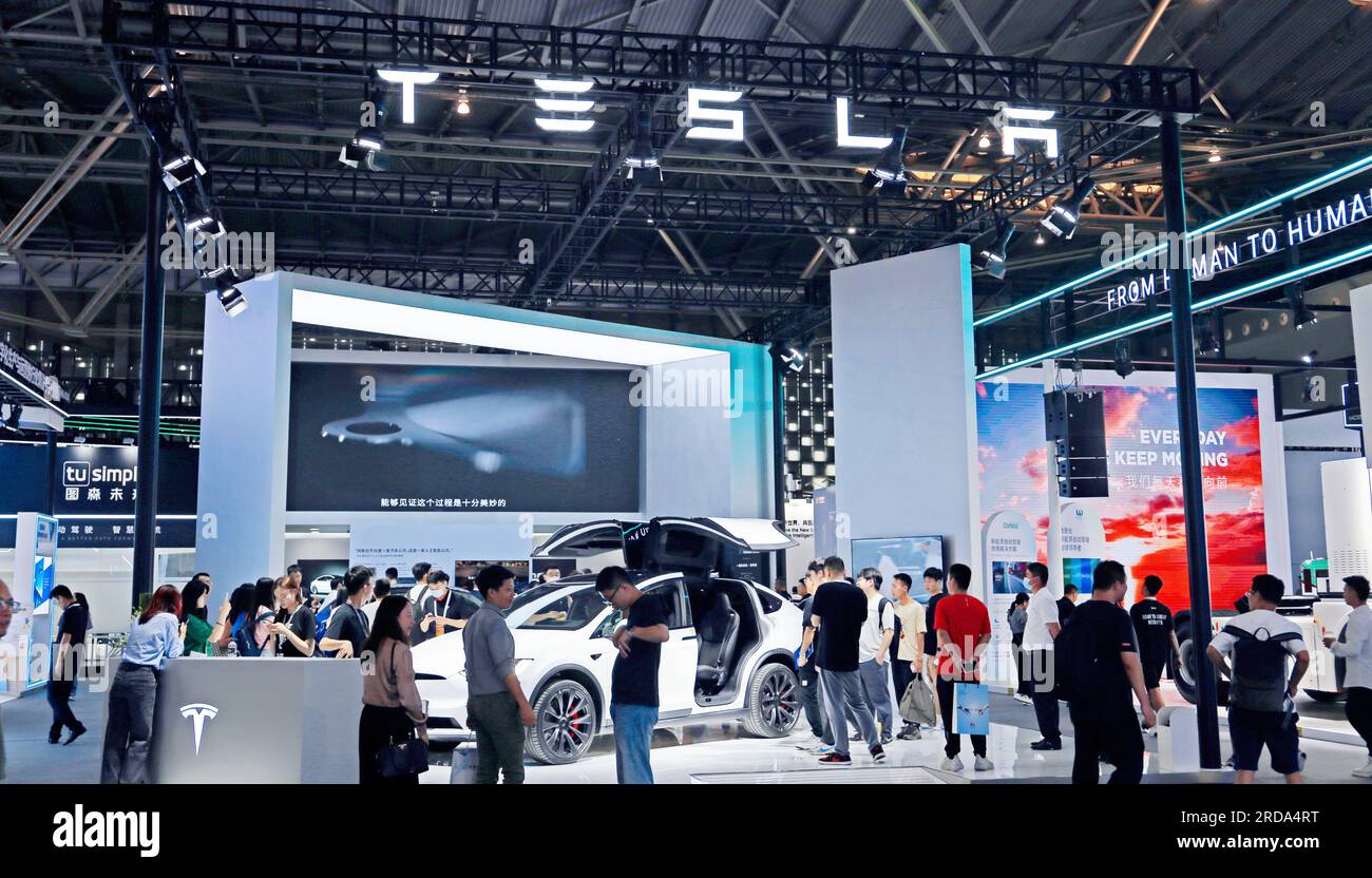 SHANGHAI, CHINA - JULY 6, 2023 - Visitors visit the Tesla booth at the ...