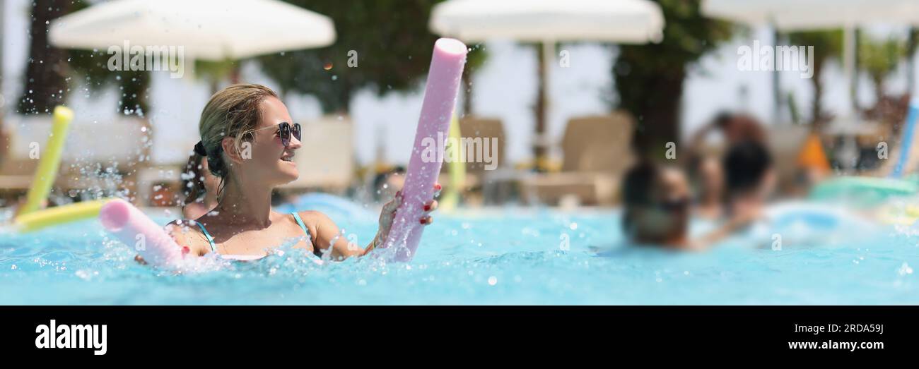 People are having fun in hotel pool Stock Photo - Alamy