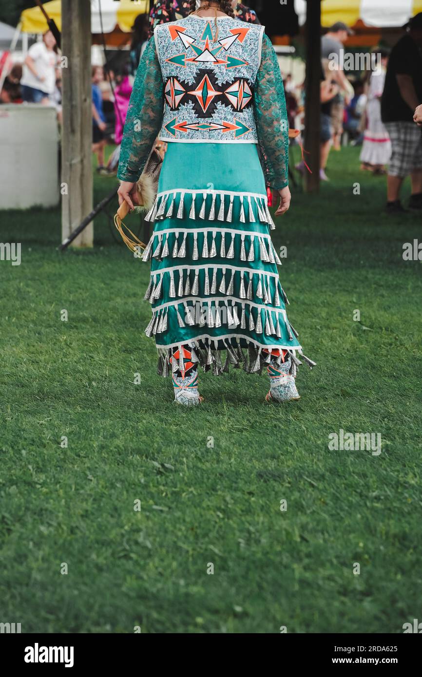 close up of decorative metal cones on a jingle dress worn by an ...