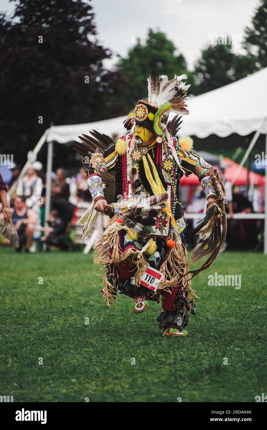 a native American male dancer at pow wow event, an indigenous people ...