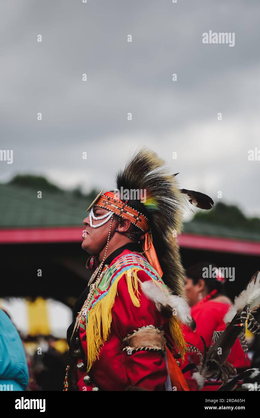 a native American male dancer at pow wow event, an indigenous people ...