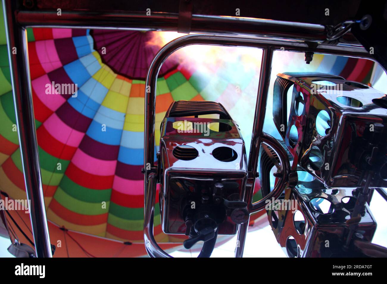 Inflation process and preparation of hot air balloon at sunrise to fly ...