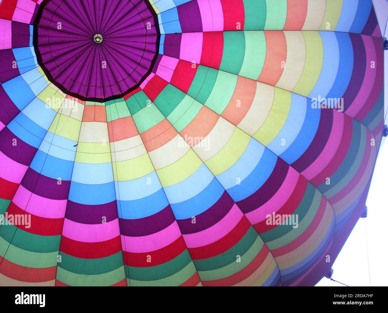 Inflation process and preparation of hot air balloon at sunrise to fly ...