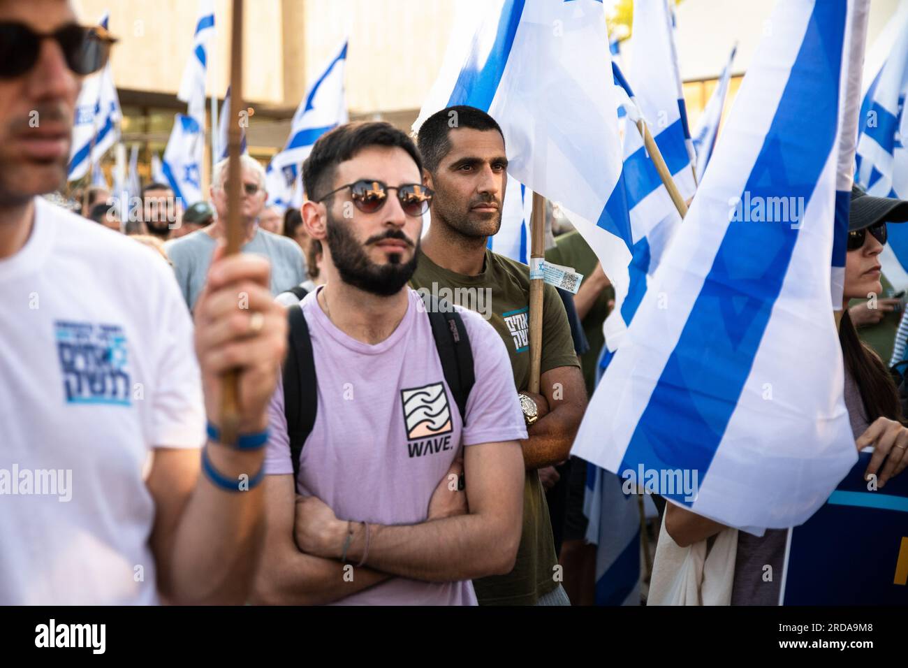 Tel Aviv, Israel. 19th July, 2023. Israeli reservists holding Israeli ...