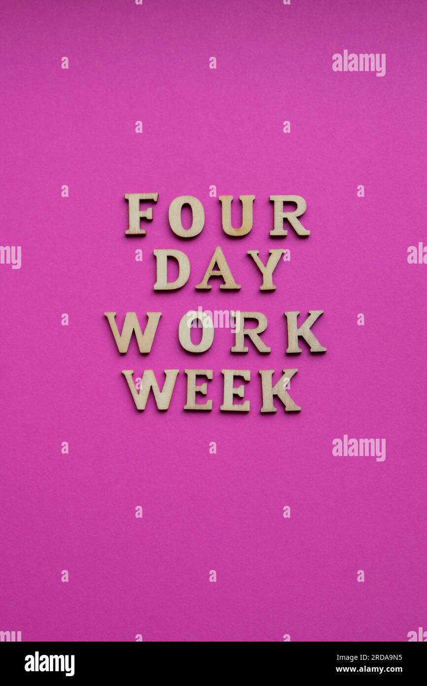 4 day work week symbol wooden letters four day working week concept. Modern approach doing ...
