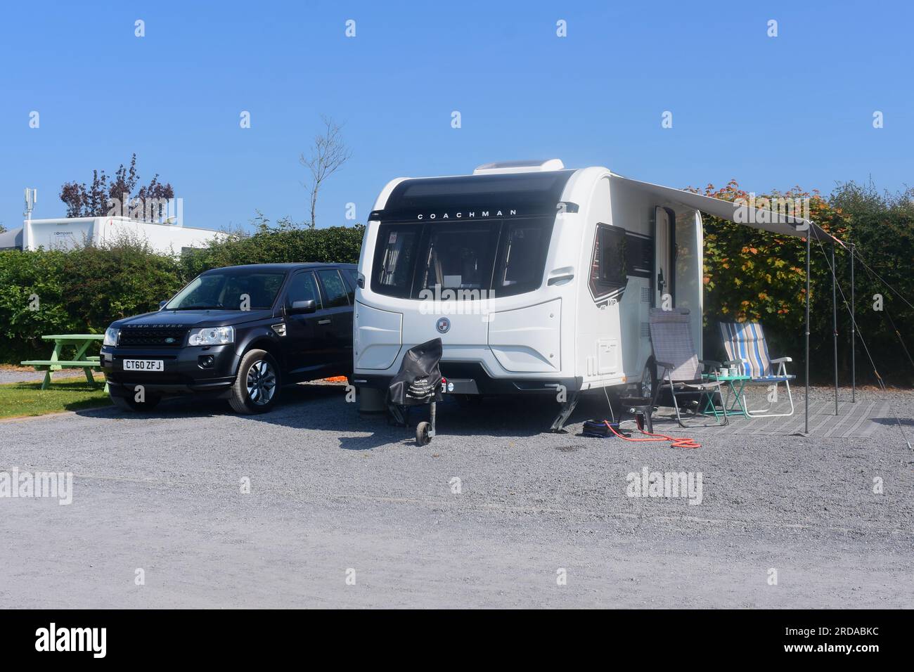 A modern car and caravan outfit on a fully serviced pitch at the Little ...