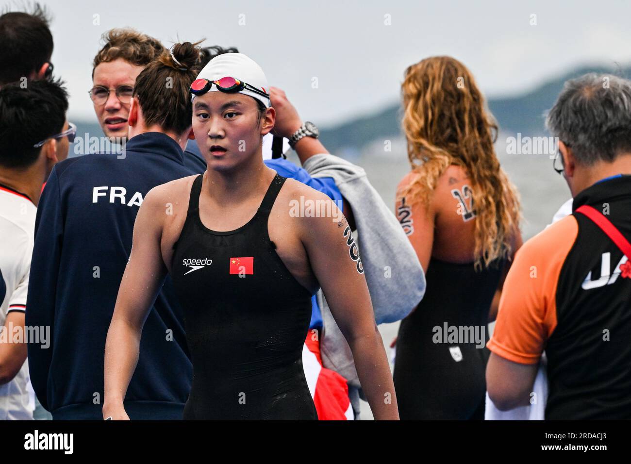 Fukuoka, Japan. 20th July, 2023. Wu Shutong (Front) of China reacts after the open water mixed ...