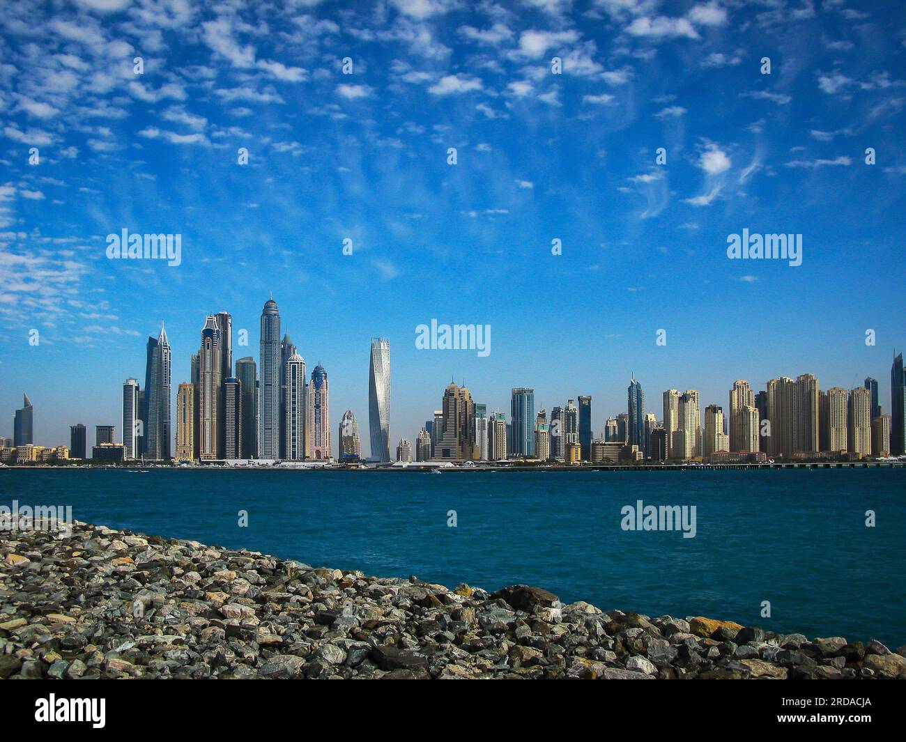 view of the beach and skyscrapers from the promenade of the artificial ...