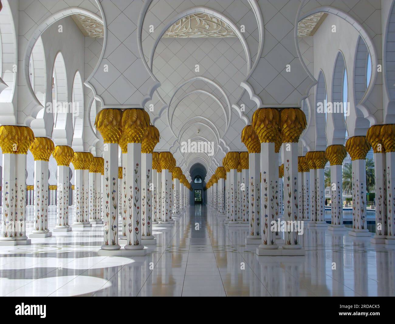 gallery with richly decorated columns in Sheikh Zayed Grand Mosque ...