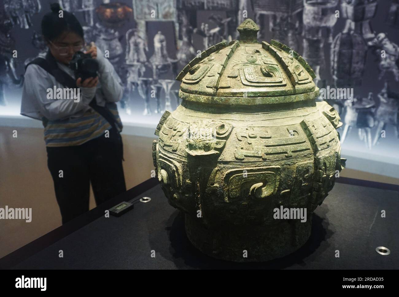HANGZHOU, CHINA - JULY 20, 2023 - Visitors look at a Taotian-shaped ...