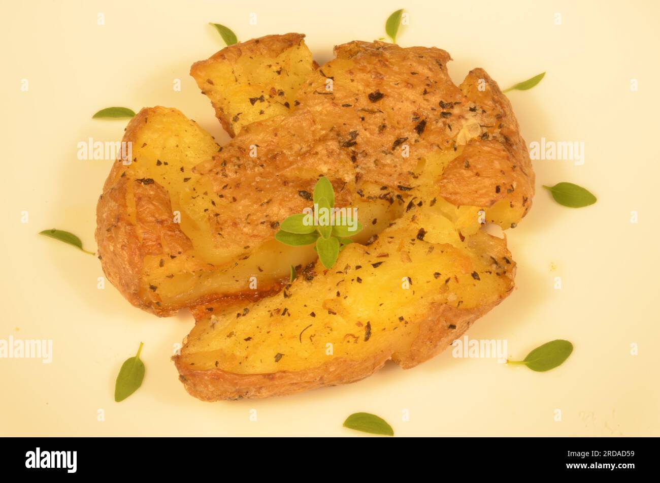 The poor potato gets a bit smashed, but it is very tasty! Stock Photo ...