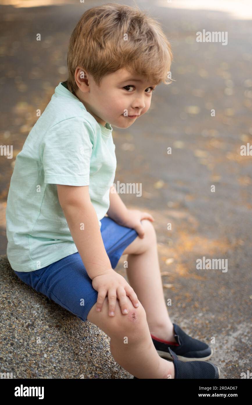 Lifestyle portrait of cute kid outdoors. Summer kids outdoor portrait ...