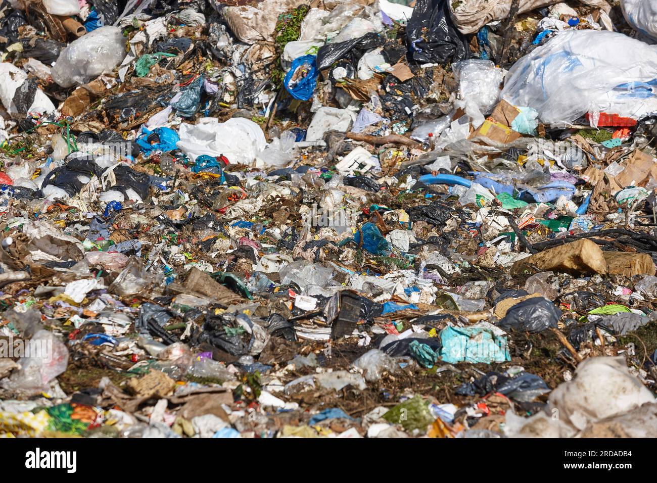 Open air garbage dump. Plastic pollution. Recycling junk. Consumerism ...