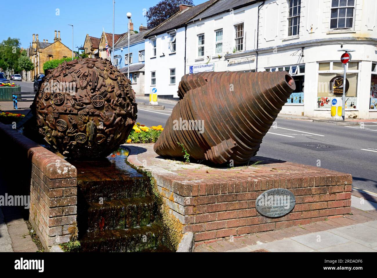 Boulder statues by Neville Cable along High Street, Chard, Somerset, UK ...