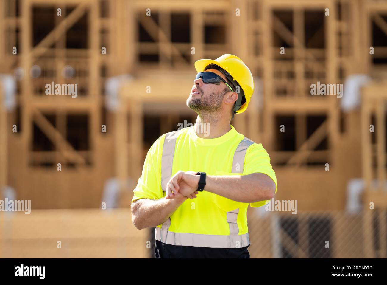 Construction worker with hardhat helmet on construction site. Engineer ...