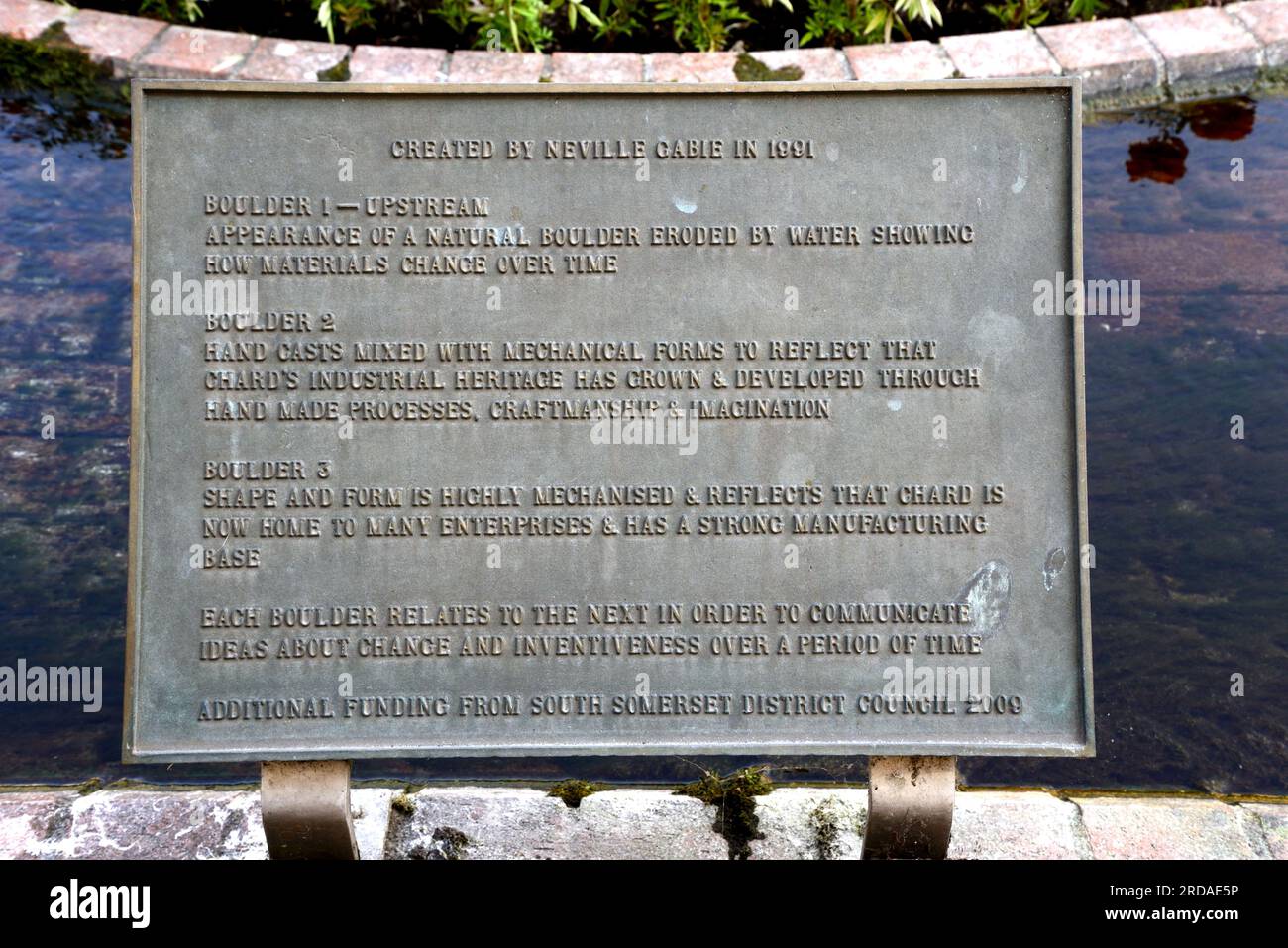 Boulder statue information sign in the town centre, Chard, Somerset, UK ...