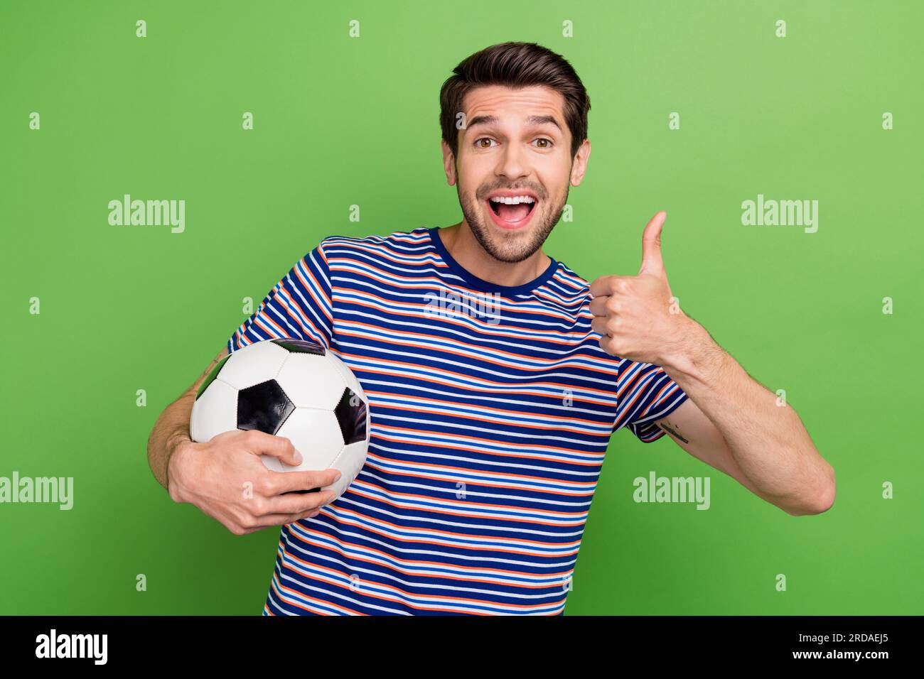 Photo of young guy excited funky football fan thumb up like sign ...