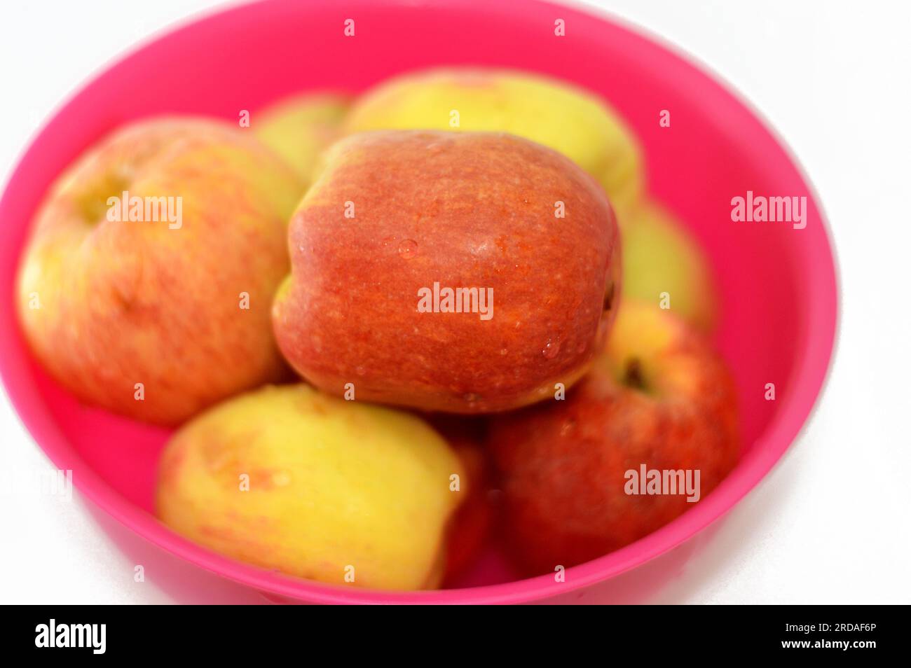 Bowl full of Egyptian fresh Apples, An apple is a round, edible fruit ...