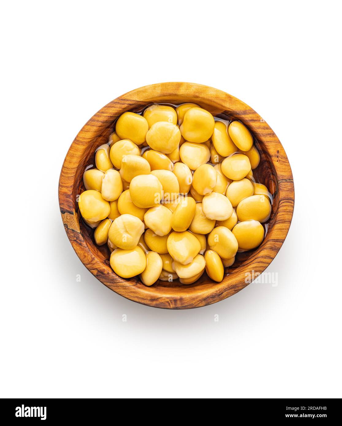Lupini beans in brine. Pickled lupin in wooden bowl isolated on the ...