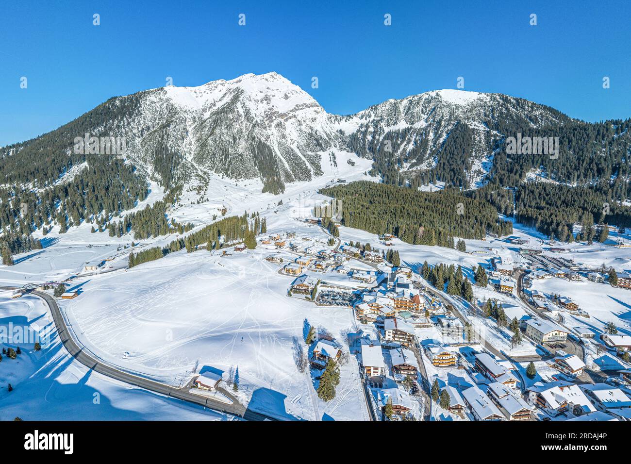 Aerial view to the wintry village Berwang in the touristic region ...