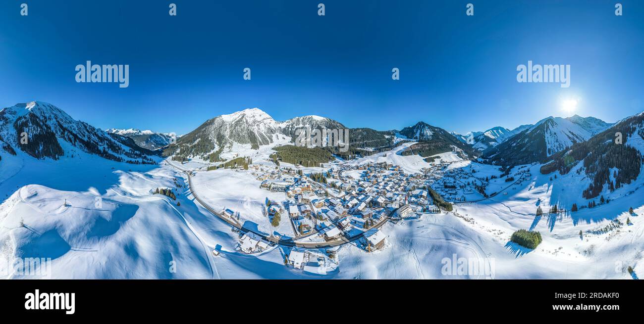 Aerial view to the wintry village Berwang in the touristic region ...