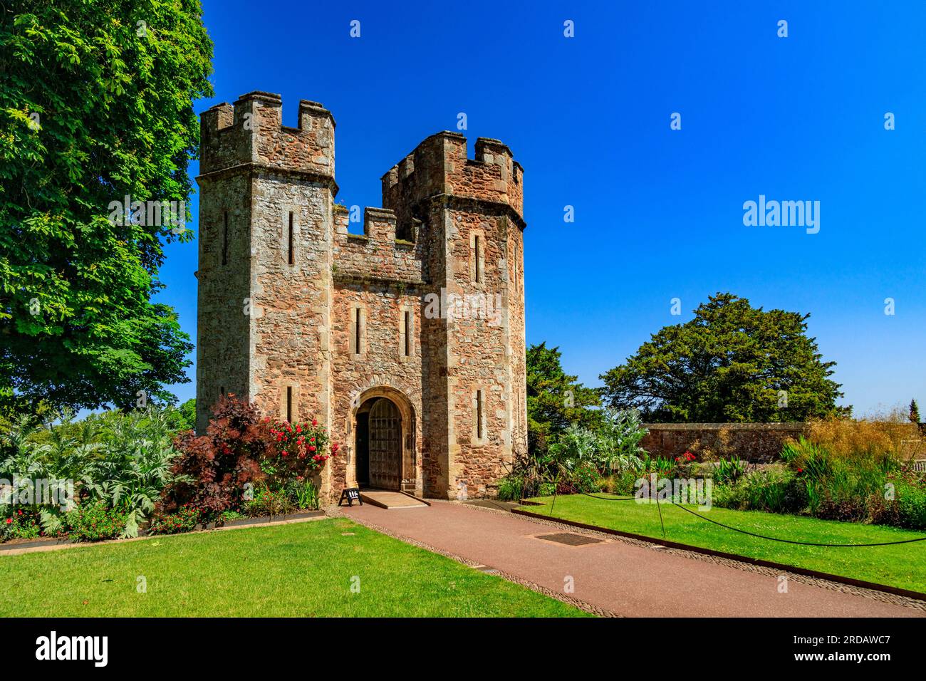 The historic 14th century Great Gatehouse at Dunster Castle, Somerset ...