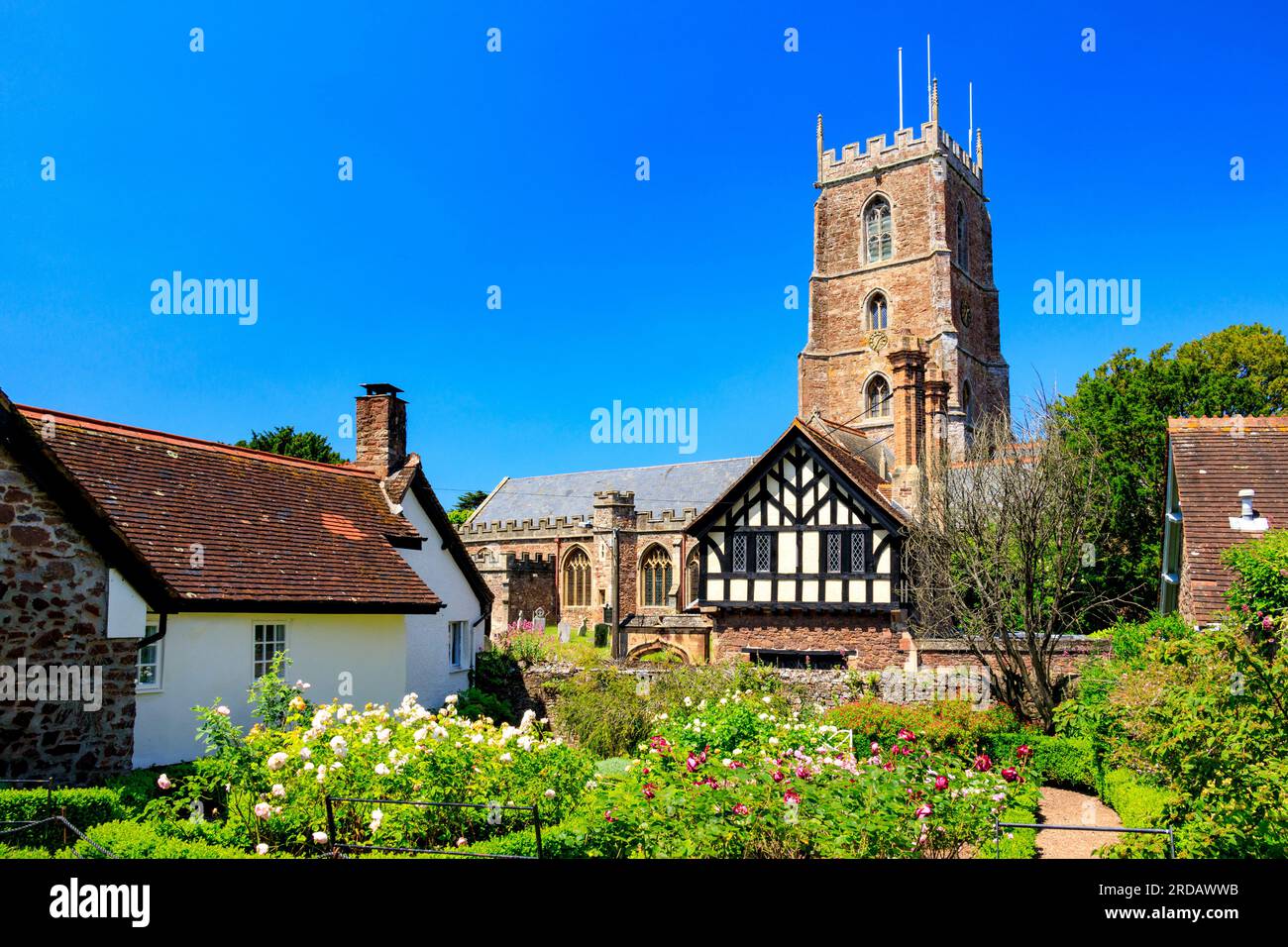 Dunster parish church of St George viewed from the Dream Garden at ...