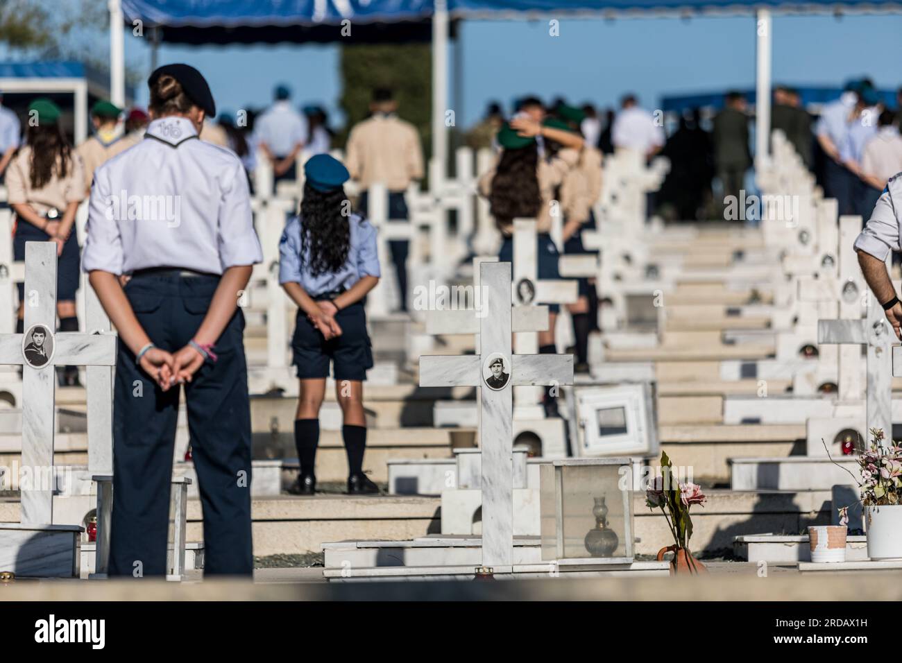 Nicosia, Cyprus. 20th July, 2023. Boyscouts are seen between the graves ...
