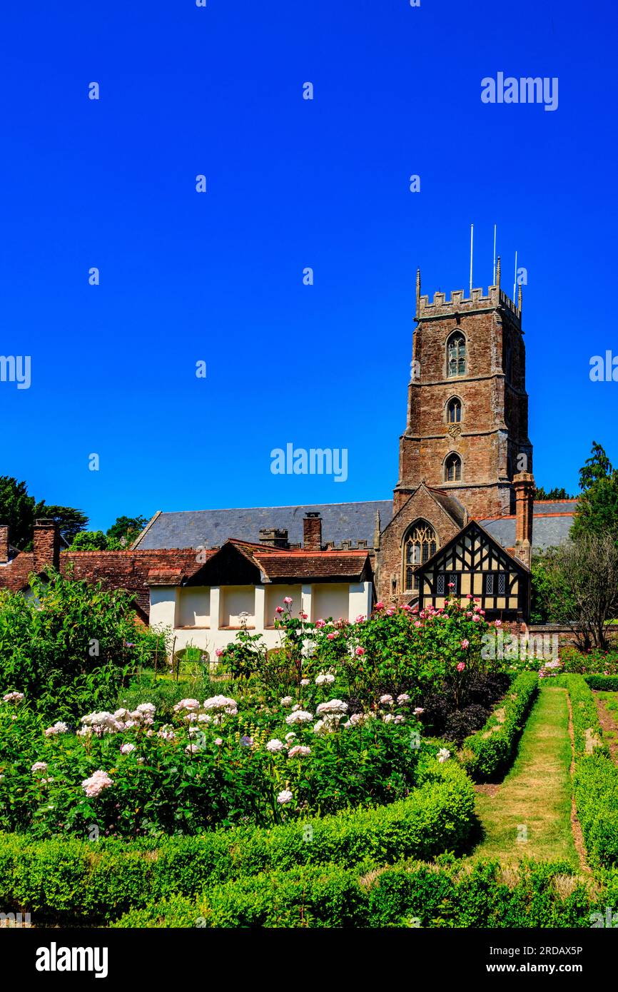 Dunster parish church of St George viewed from the Dream Garden at ...