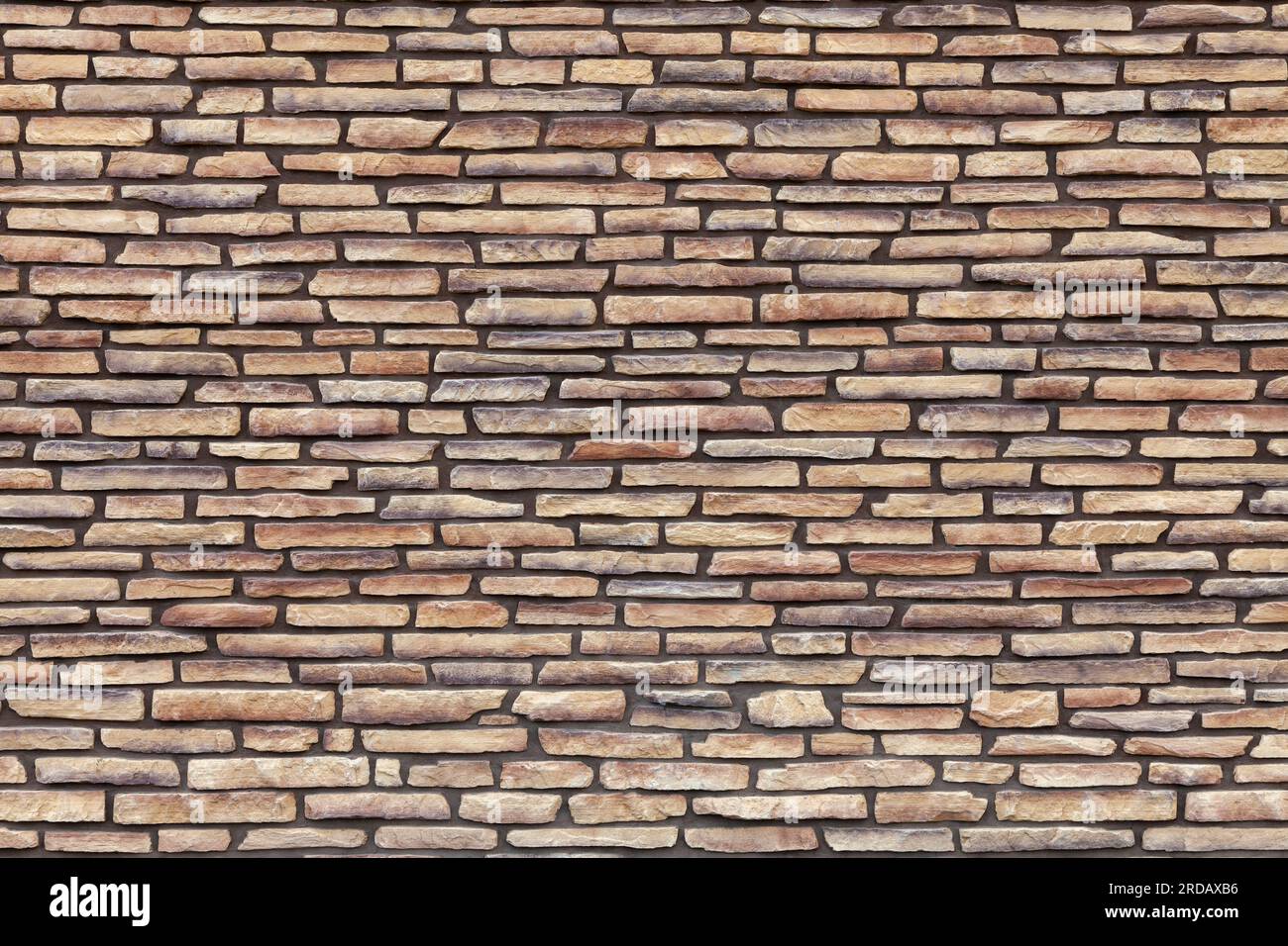 Texture of a wall made of flat stones Stock Photo - Alamy