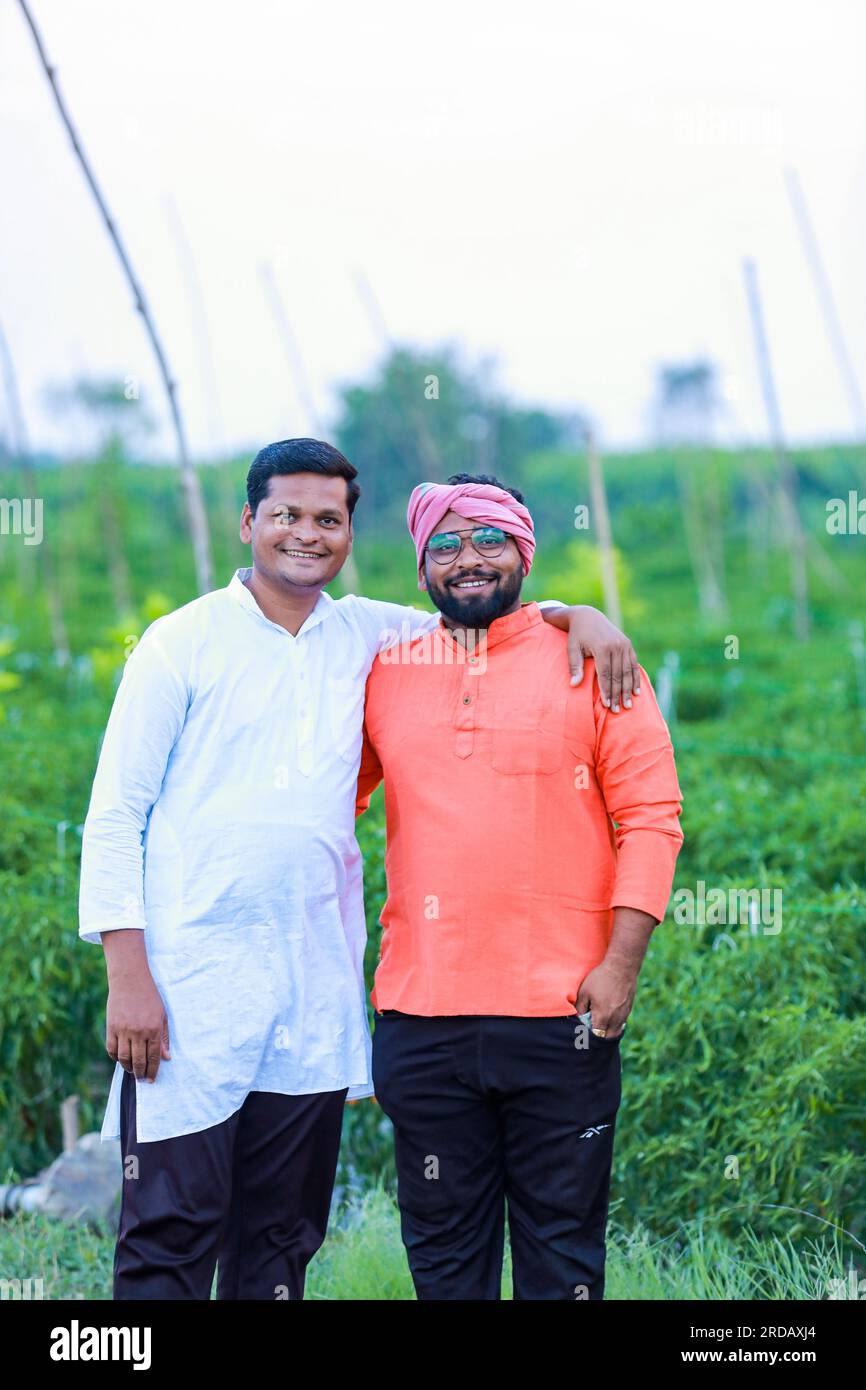 two indian farmer standing in farm, happy farmer , brothers Stock Photo ...