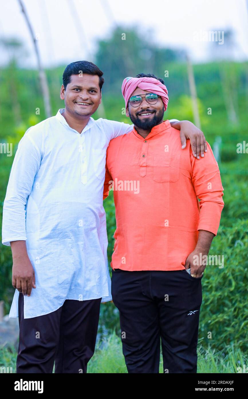 two indian farmer standing in farm, happy farmer , brothers Stock Photo ...