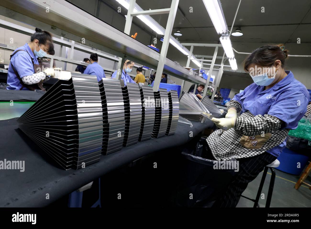 NINGDE, CHINA - JULY 20, 2023 - Workers produce precision structural ...