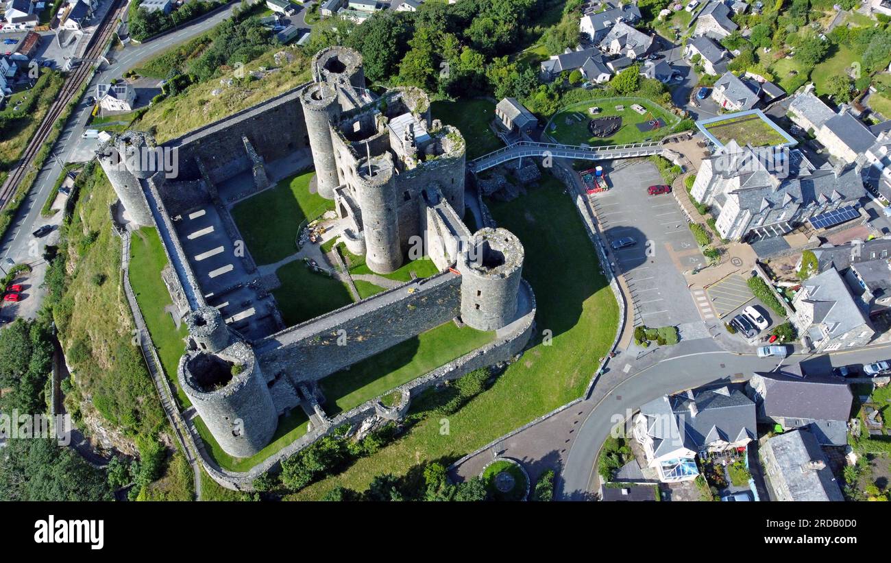 Aerial drone view of Harlech Castle, a hilltop medieval fortification ...