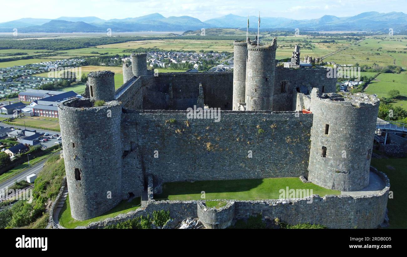 Aerial drone view of Harlech Castle, a hilltop medieval fortification ...