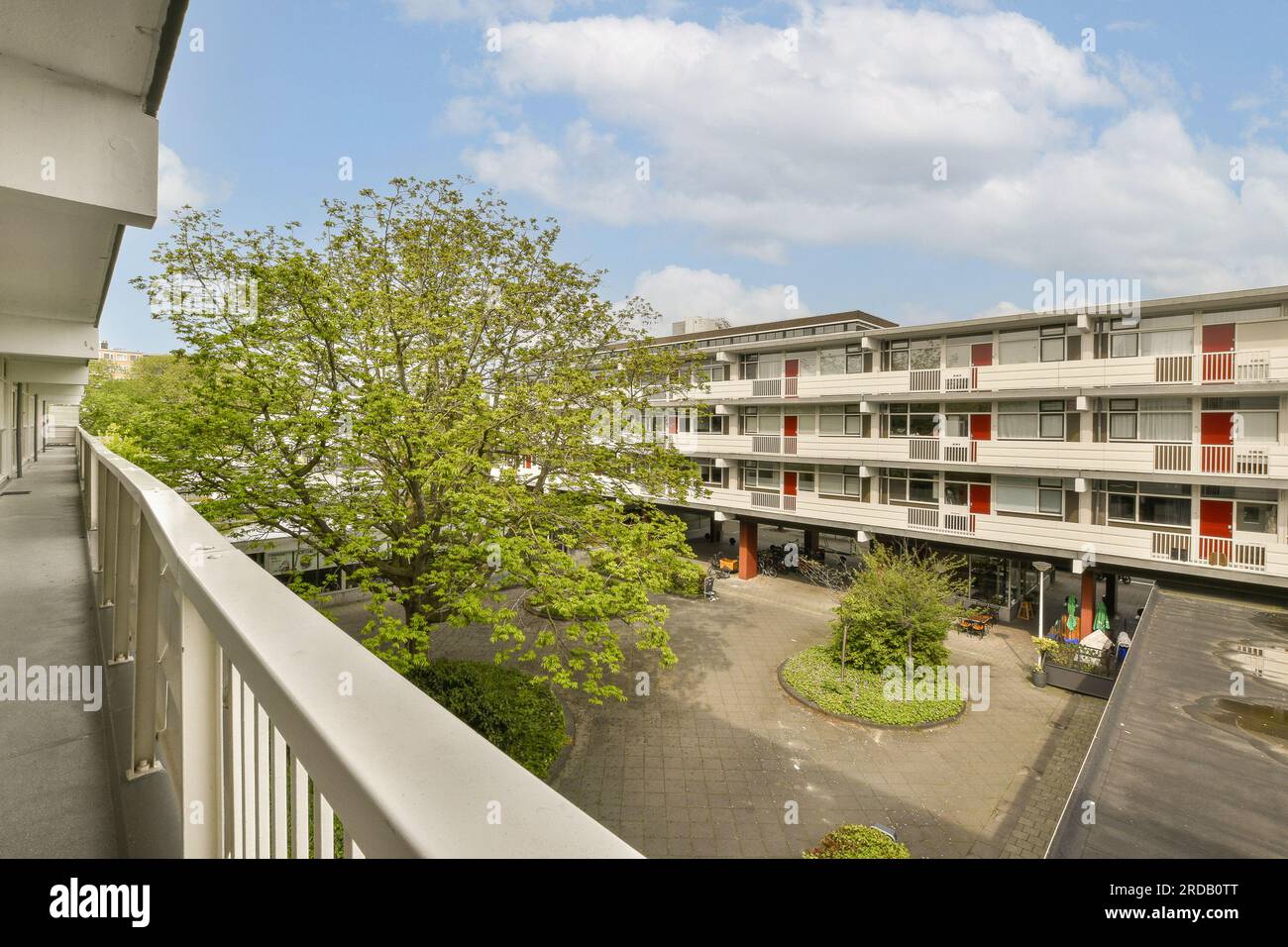 an outside area with buildings and trees in the fore - image was taken ...