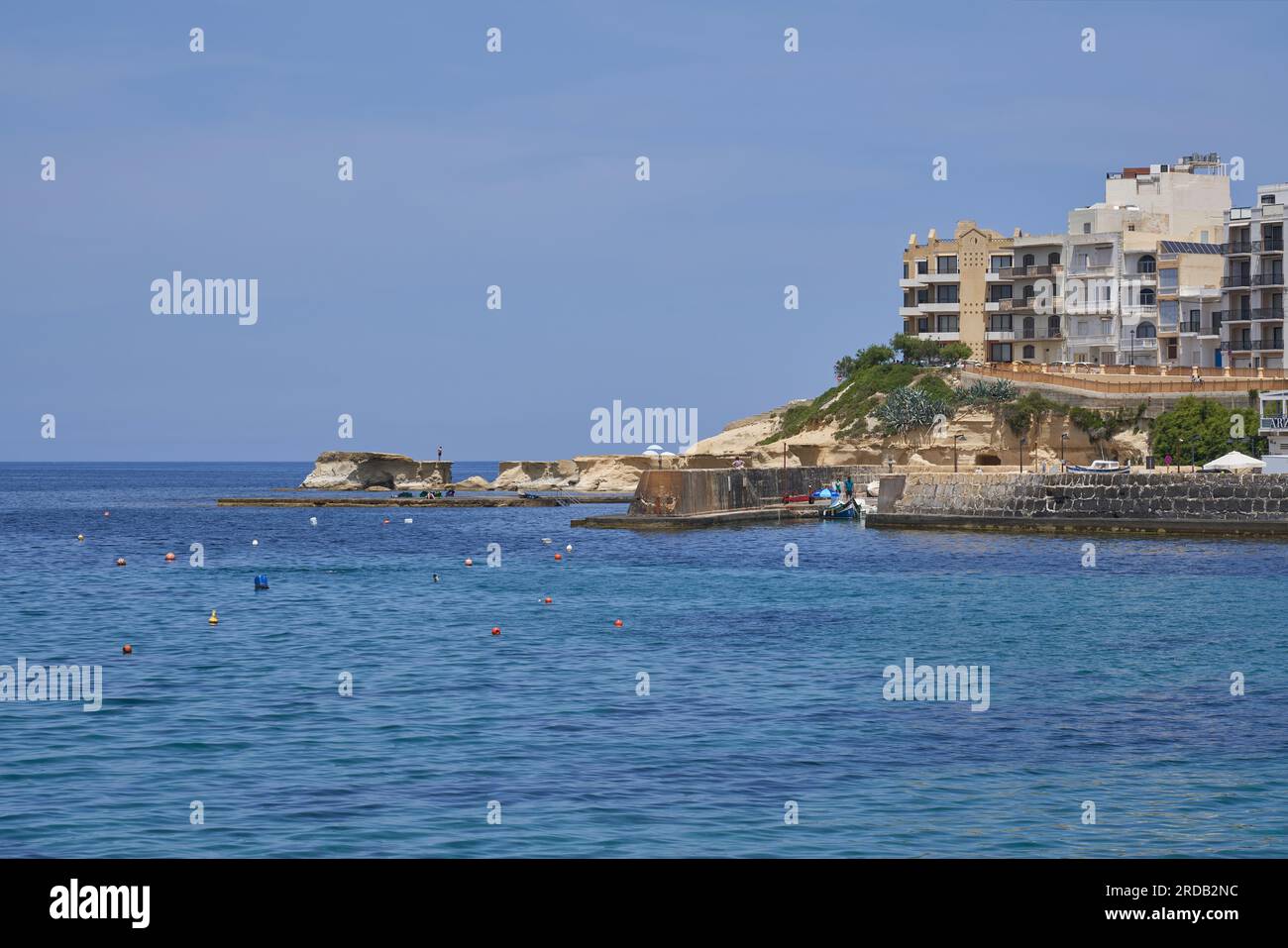 Scenic bay of the coastal resort of Marsalforn on the island of Gozo in ...