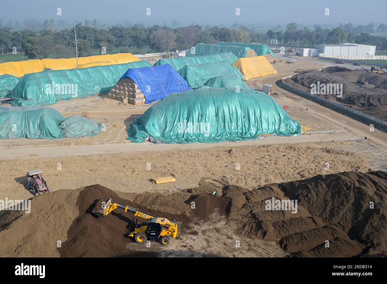 INDIA, Punjab, Lehragaga, Verbio biogas plant process paddy straw to ...
