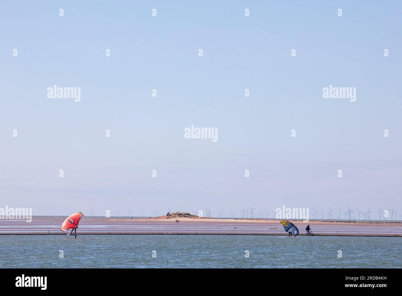 A dog walker with The Burbo Bank Offshore Wind Farm is a 348 MW ...